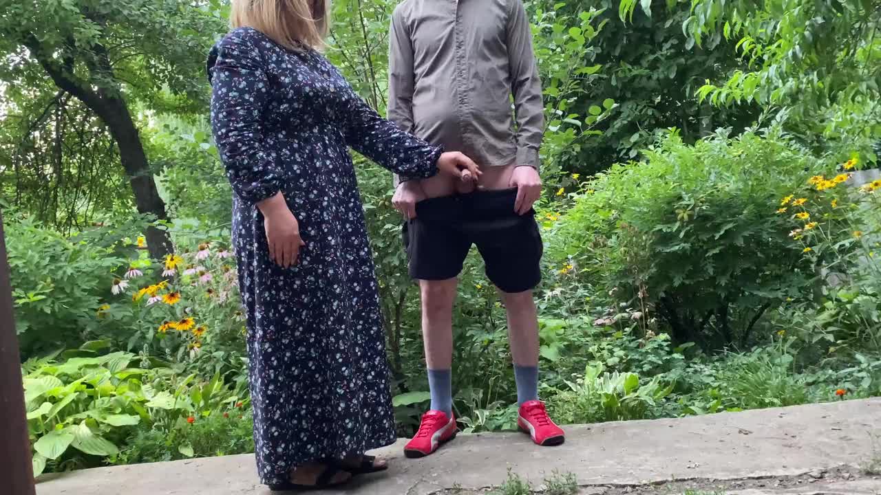 mummy milf helps her stepson piss outside and piss standing herself - hotntubes.com