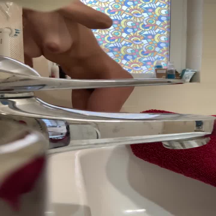 spying on a fit woman when she has a good ejaculation in the shower - hotntubes.com